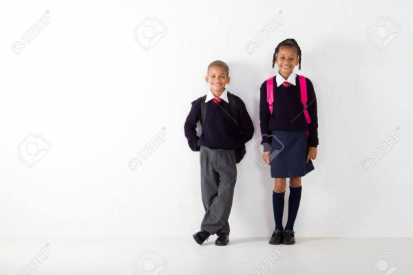 10739941-two-primary-students-standing-against-wall – Unimode